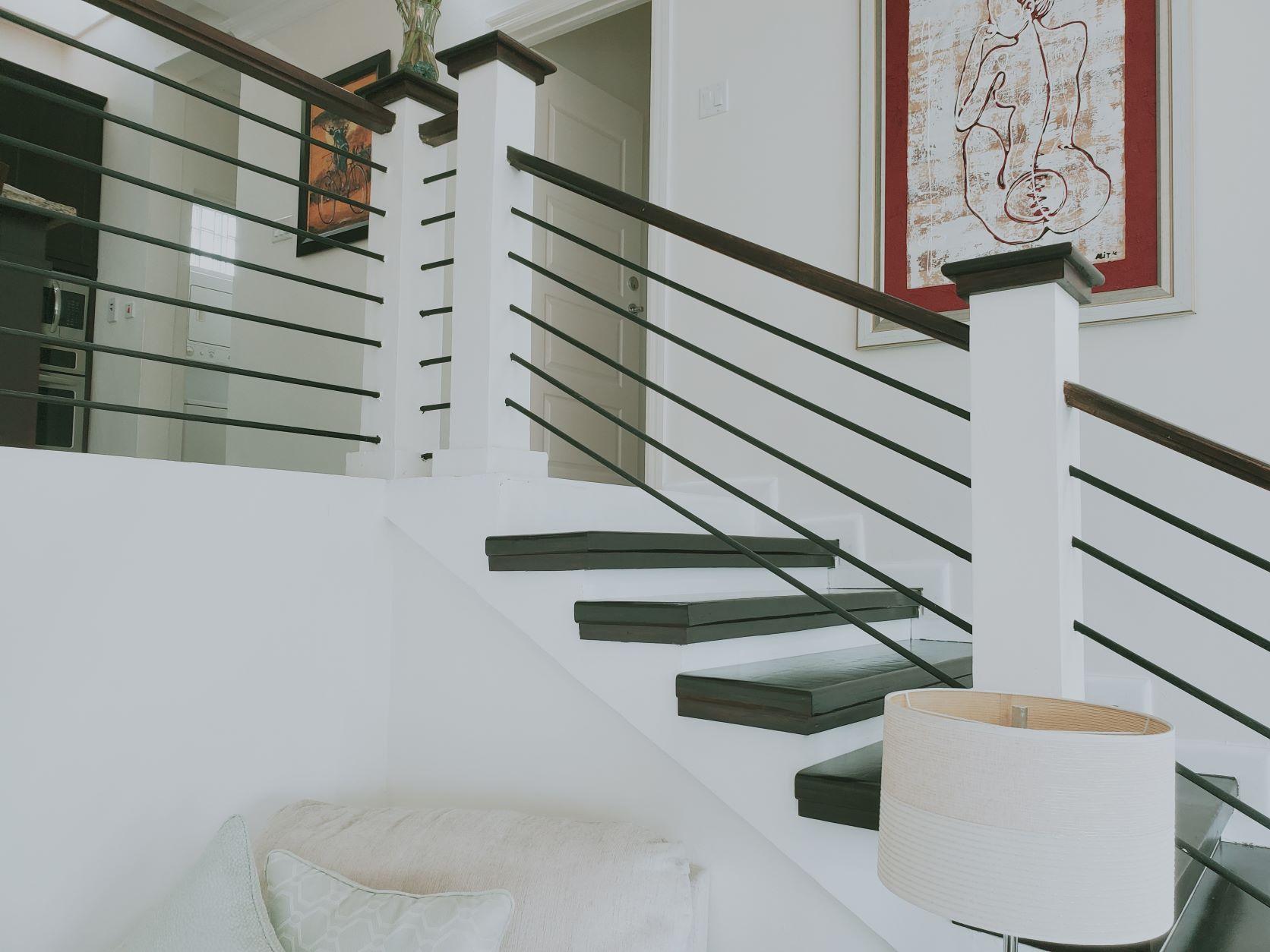 How we Transformed our Fixer-Upper Home Staircase on a Budget
